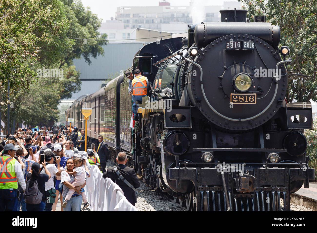 Final Spike Steam Tour Visitors are seen next to the Empress 2816 steam ...