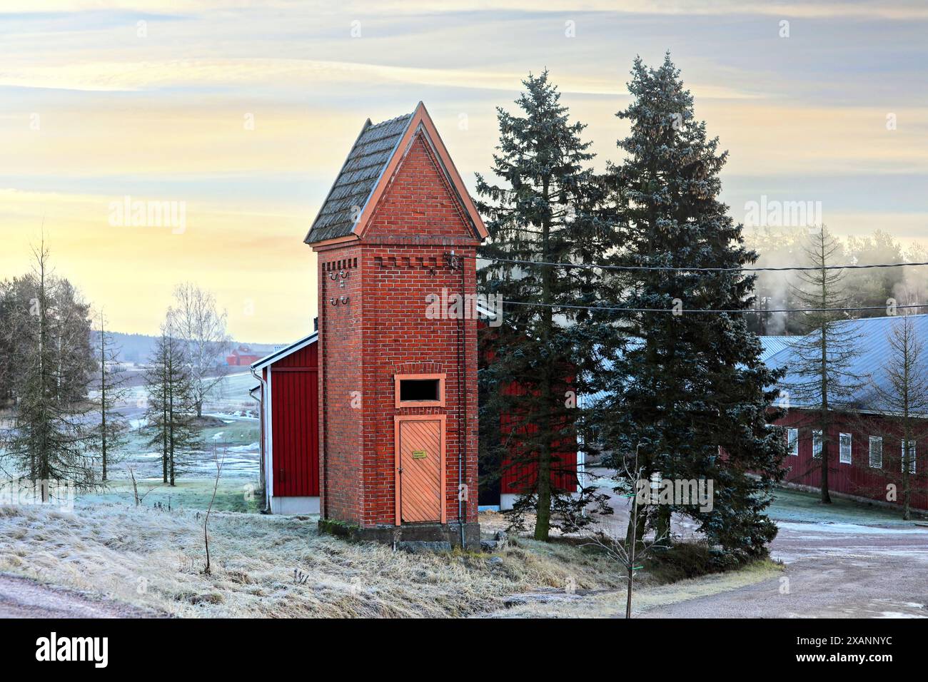Old transformer building in rural Finland on a frosty, misty winter ...