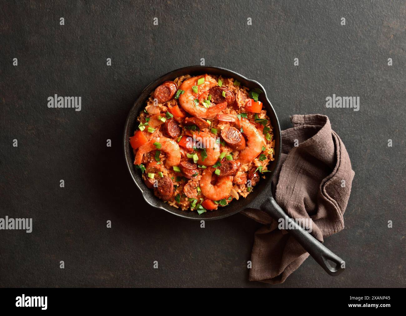 Creole style jambalaya with prawn, smoked sausages and vegetables in ...