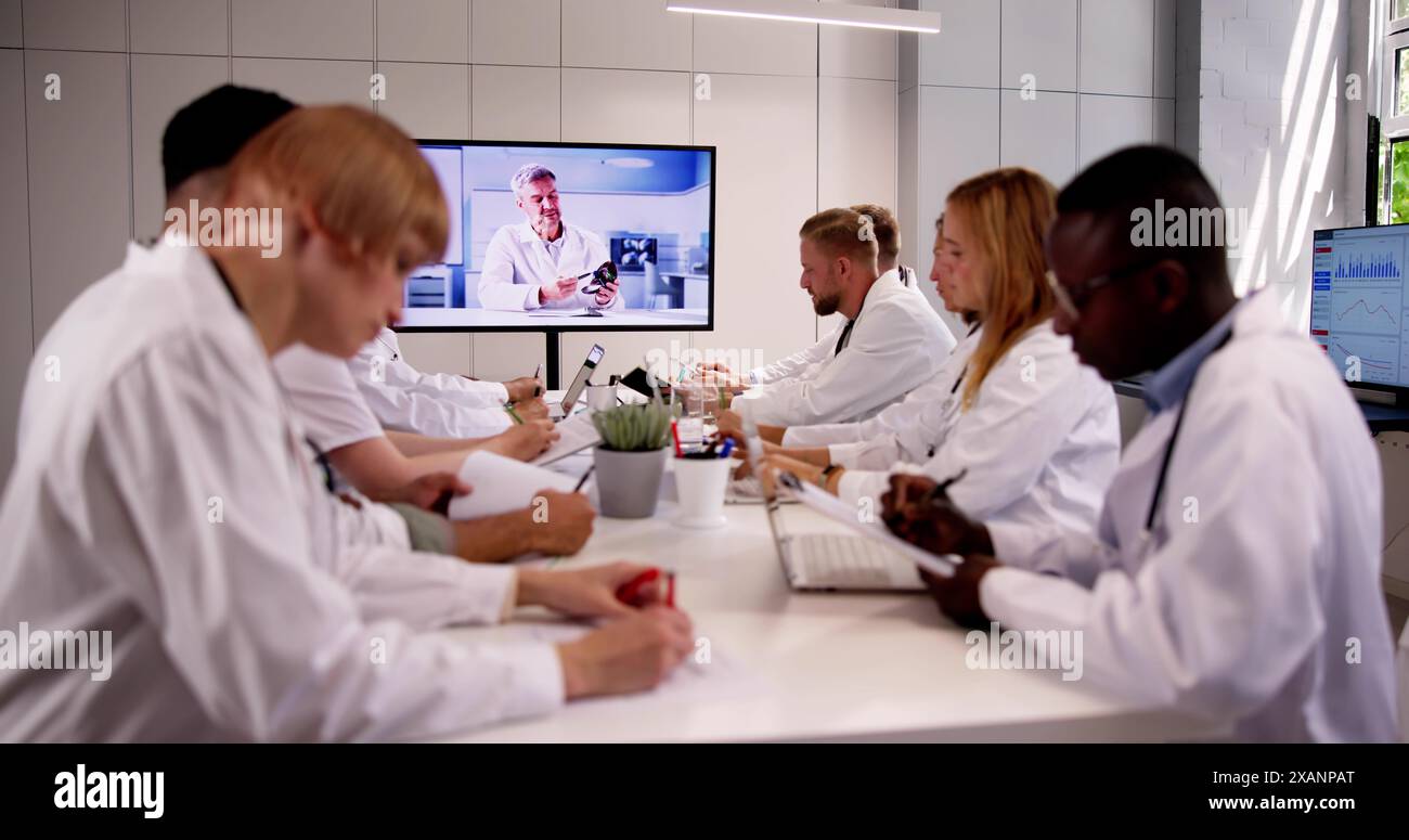 Diverse doctors having video conference hi-res stock photography and ...