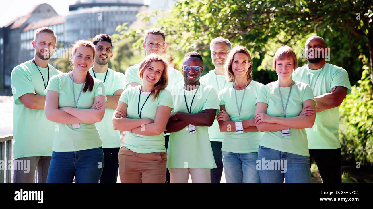 Diverse Group Of People Volunteering Community. Team Service Stock ...