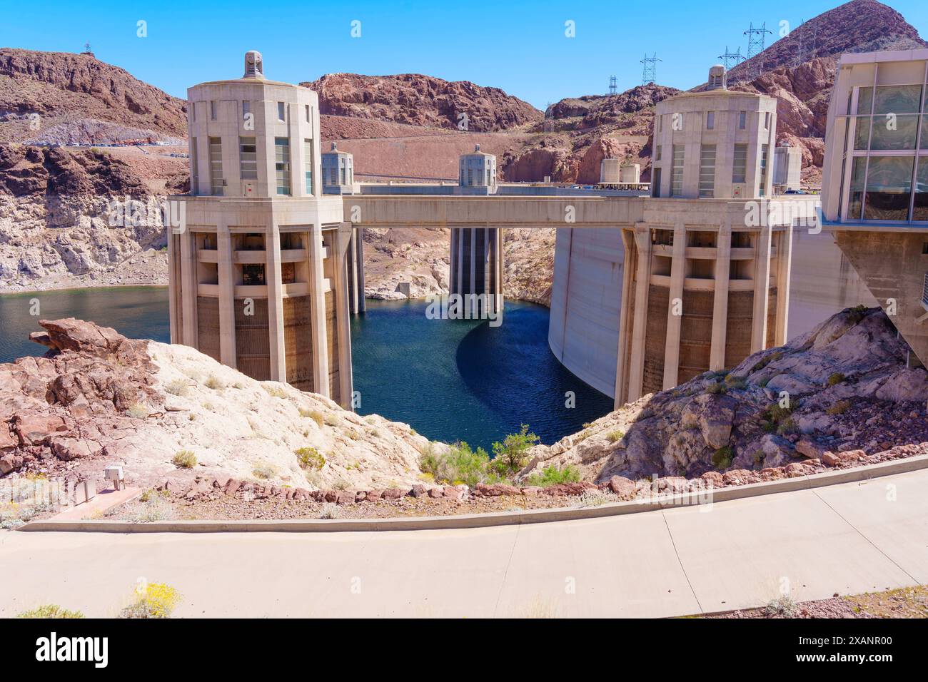 Hoover Dam’s Concrete Structure and Intake Towers in Rugged, Reddish ...