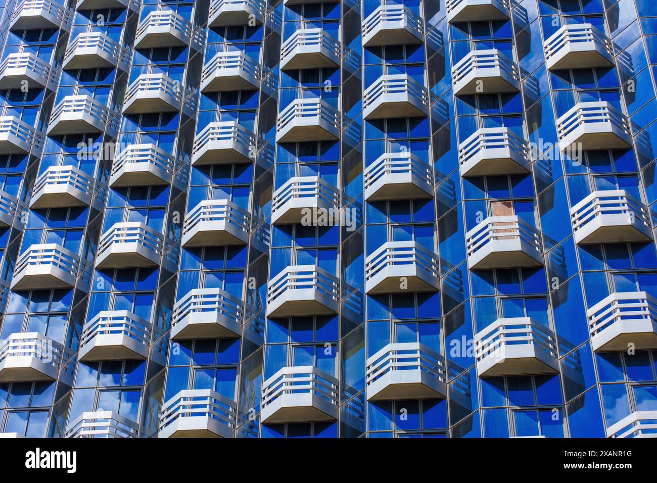 Abstract background featuring a pattern of repeating balconies on the ...