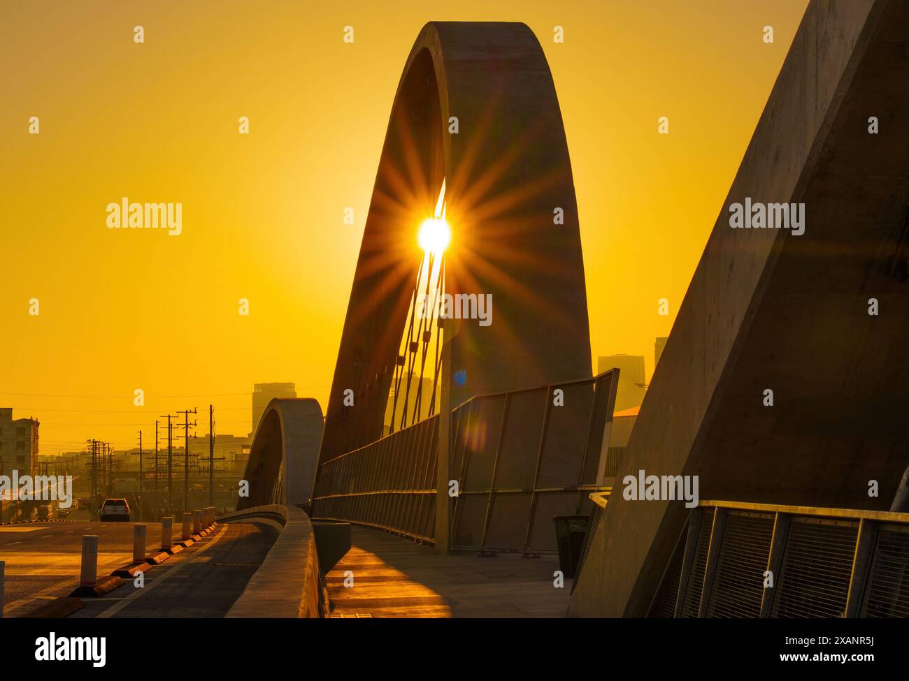 Visually striking sunset captured through the center of the 6th Street ...