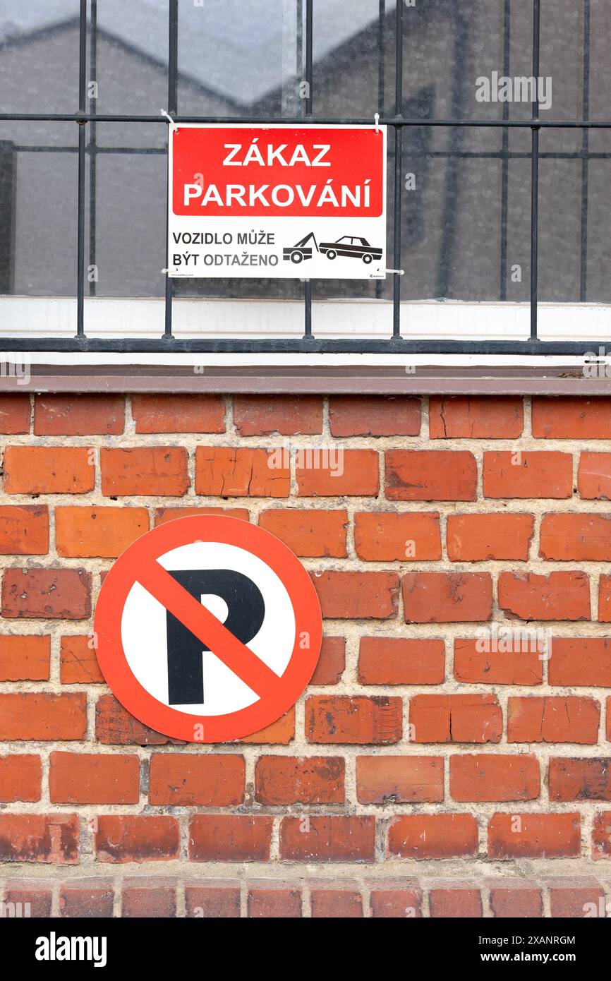 Red circle traffic sign and rectangular sign restricting parking in ... Red circle traffic sign and rectangular sign restricting parking in ...