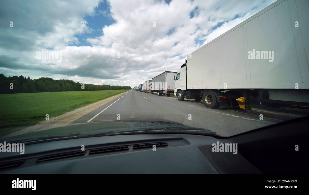 A jam of vans on the roads of Europe. View from the car window Stock ...