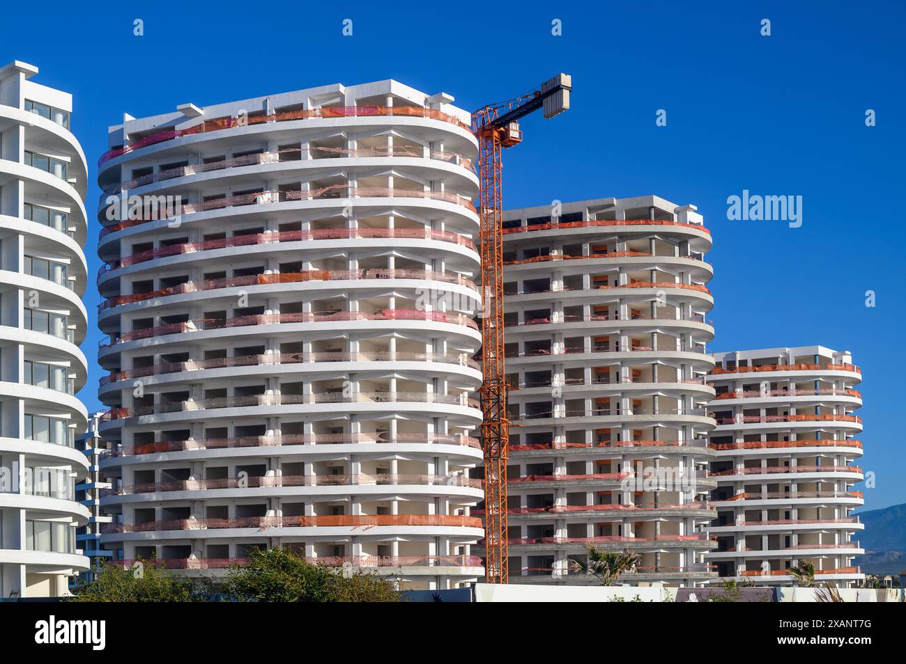 tower crane builds a residential complex near the Mediterranean Sea ...
