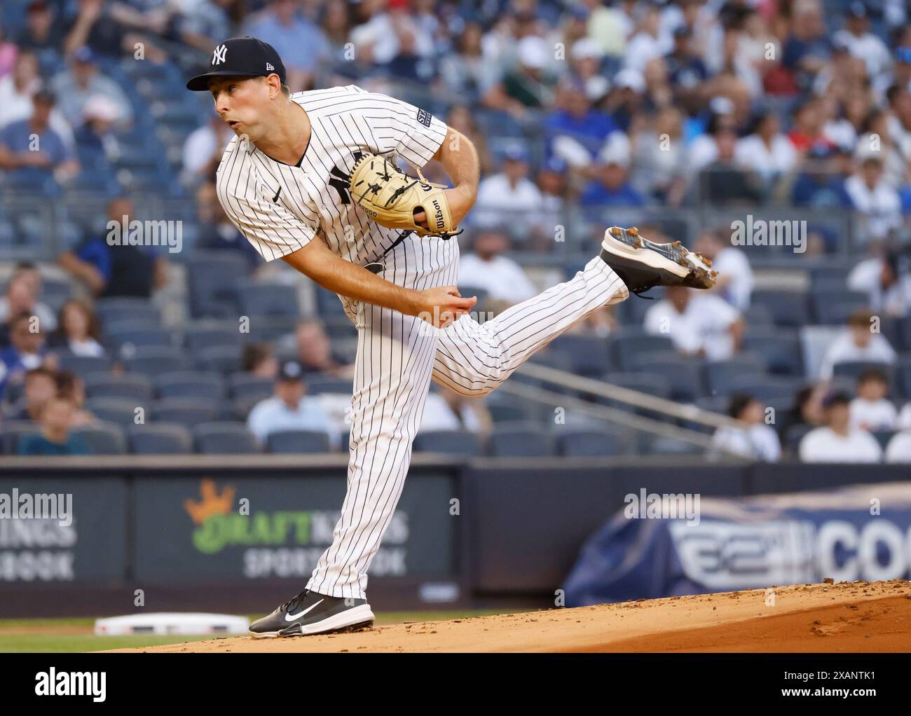 New York Yankees starting pitcher Cody Poteet throws a pitch in the ...
