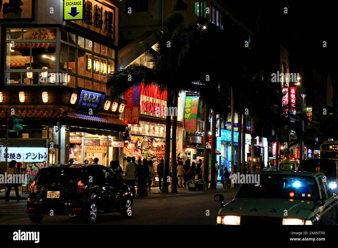 Japanese scenery Kokusai-dori shopping street in Naha city at dusk ...