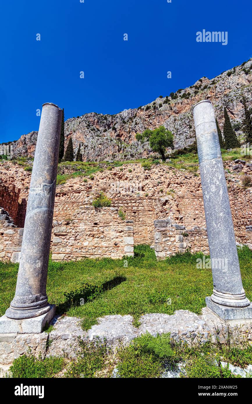 Ancient columns of Delphi, an archaeological site in Greece, are Greek religious sanctuaries ...