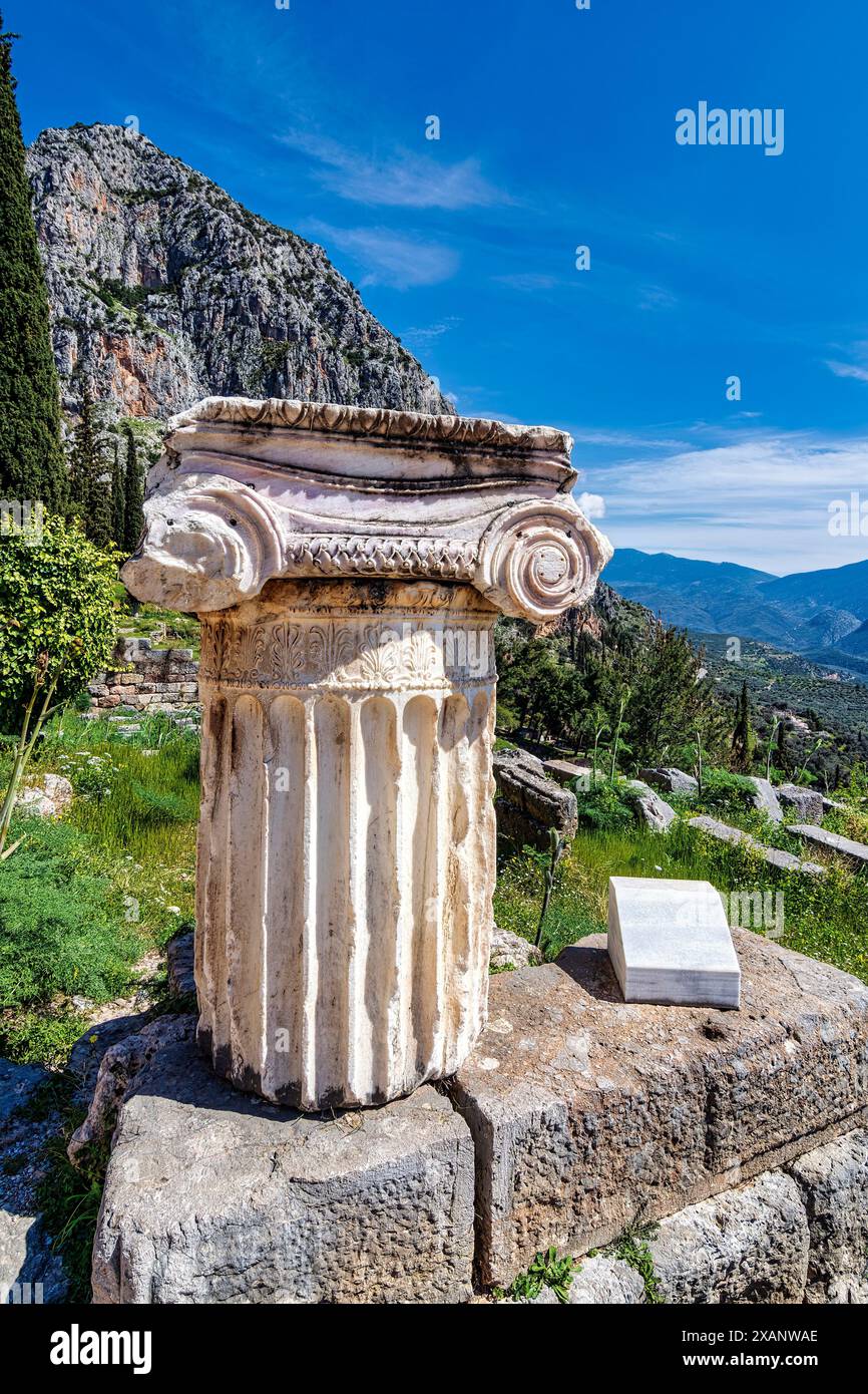 Ancient Greek column at the Delphi archaeological site. Delphi was ...