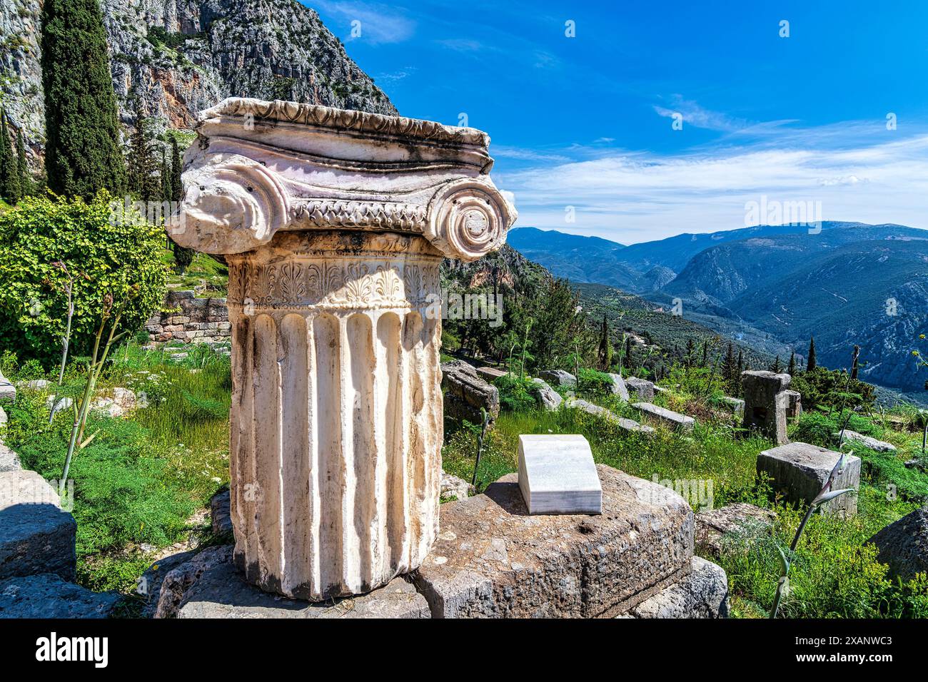 Ancient Greek column at the Delphi archaeological site. Delphi was ...