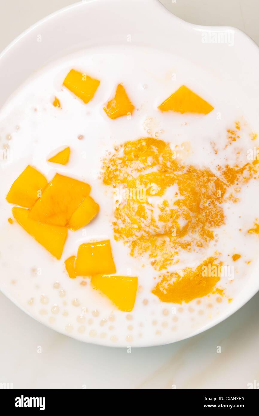 top view mango pomelo sago with ice cream at vertical composition Stock ...