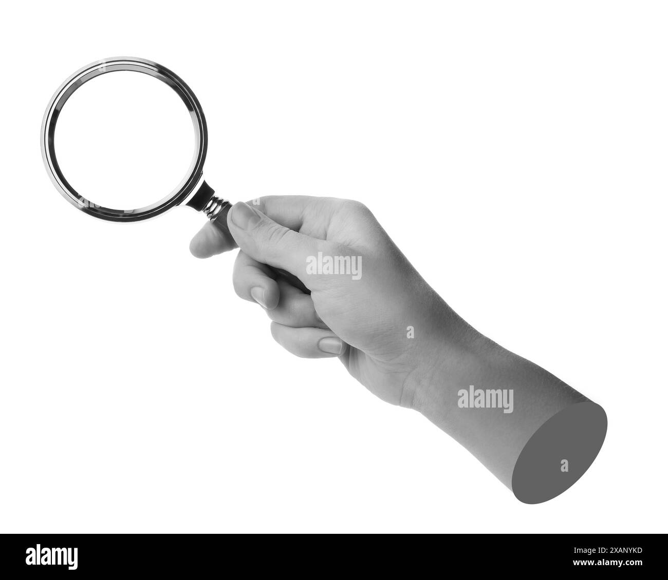 Woman's hand with magnifying glass on white background. Black and white ...