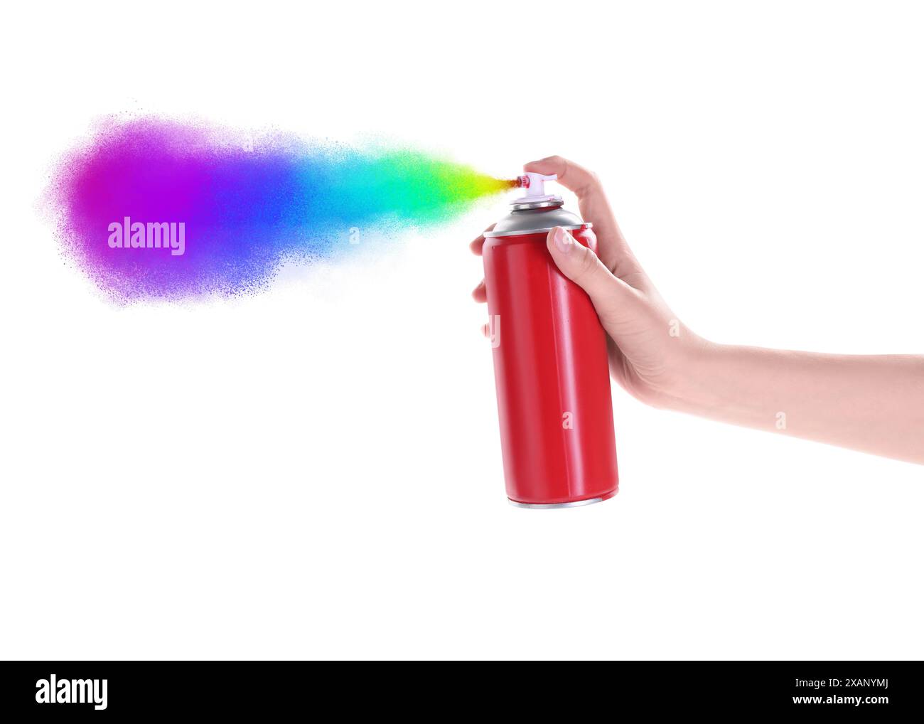 Hand holding spray bottle spraying white paint on wall hi-res stock ...