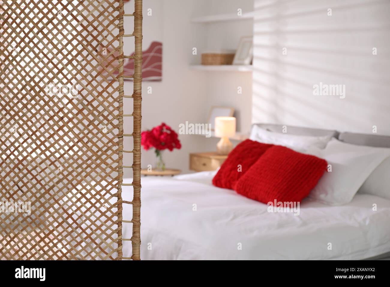 Beautiful folding screen and large bed in bedroom. Interior design ...