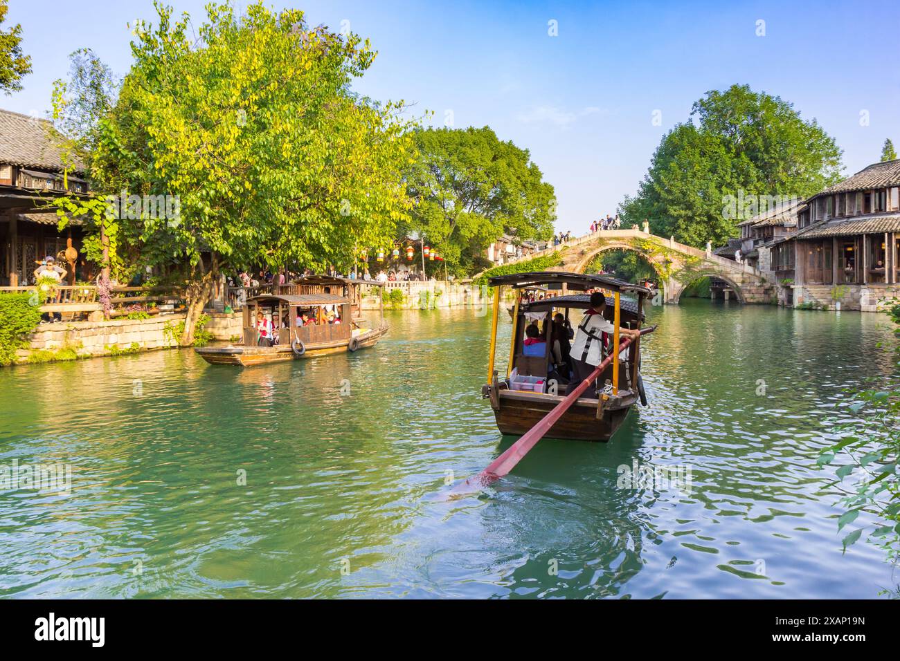 Paddle boat in the Xishi river of Wuzhen, China Stock Photo - Alamy