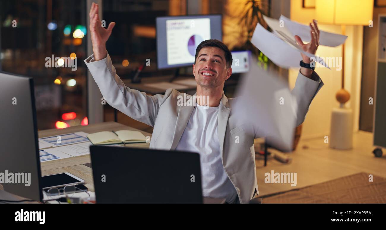 Happy businessman, laptop and night with celebration for completion ...
