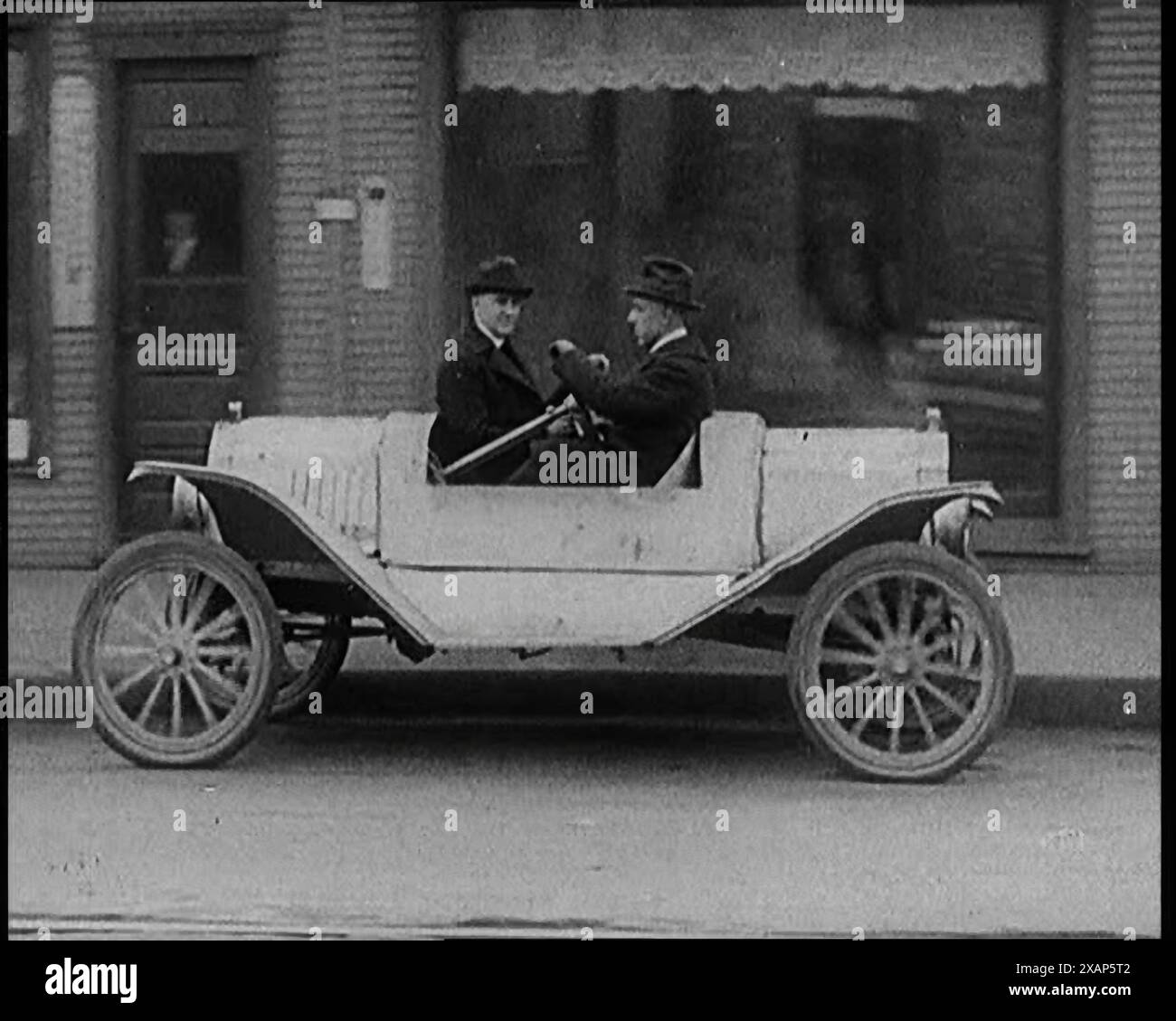 Male Civilians Test Driving the Two Way Car Which Has Two Steering ...