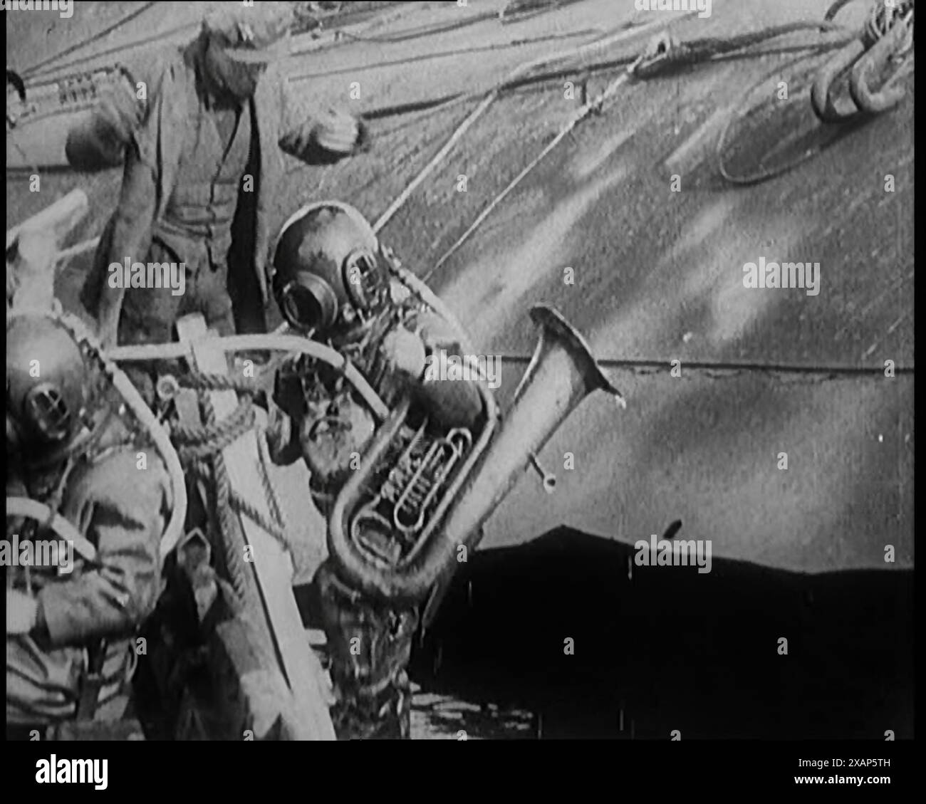 A Diver Coming up from the Sea Carrying a Tuba, 1929. Items recovered ...