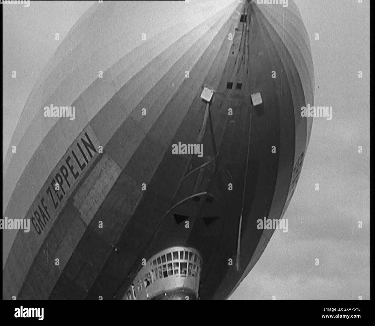Graf Zeppelin flying overhead, 1929. 'Airships - a lot of people ...