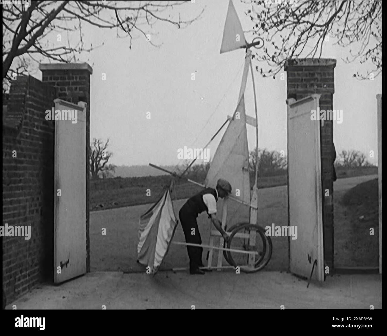 Male Civilian Carrying a Small Pedal Powered Flying Machine and Trying ...