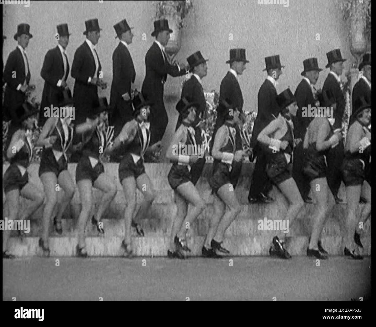 Scene from a Stage Show: a Large Dance Troop Tap Dancing on Steps in ...