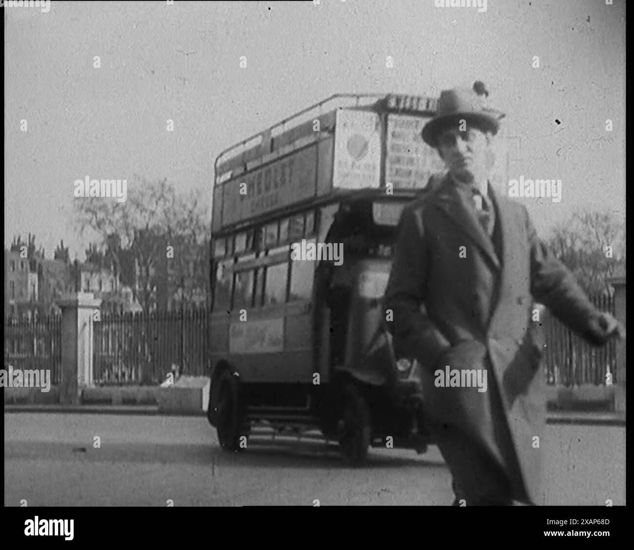 Male Civilian Crossing the Street in Front of Heavy Cars and Buses ...