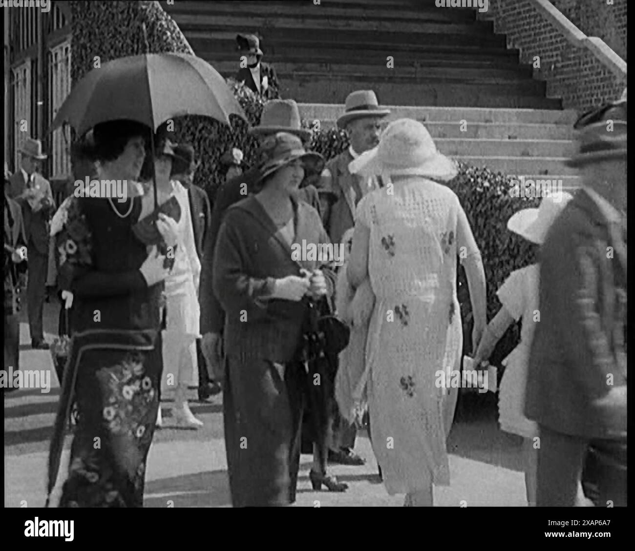 Civilians Walking Outdoors Wearing Evening Outfits and Hats, 1920s ...