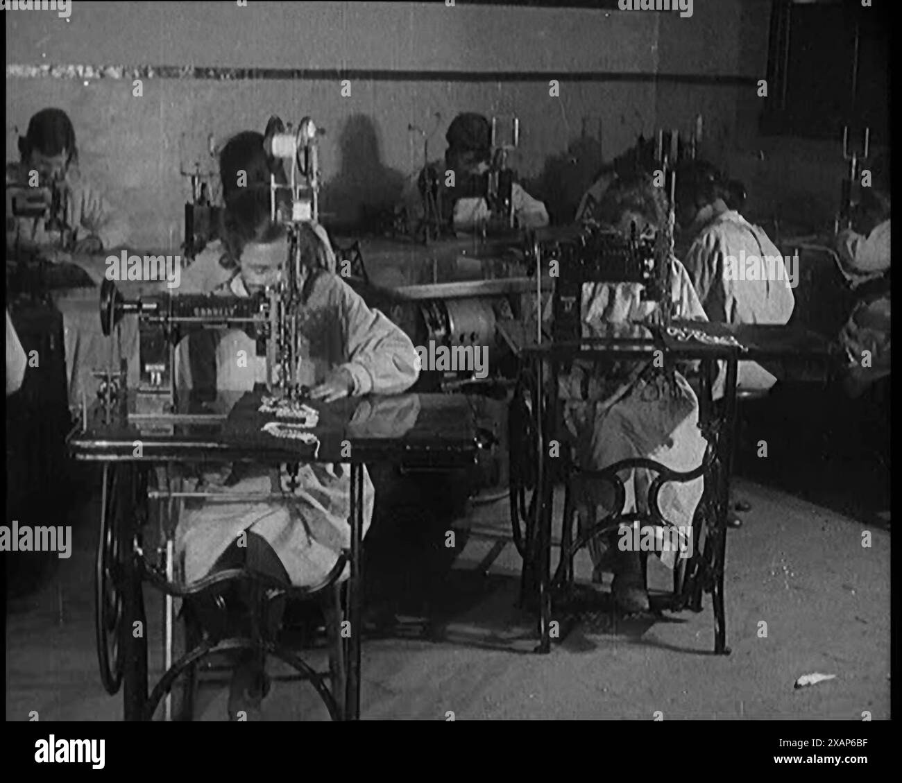Young Female Civilians Operating Sewing Machines in an Arts Class ...
