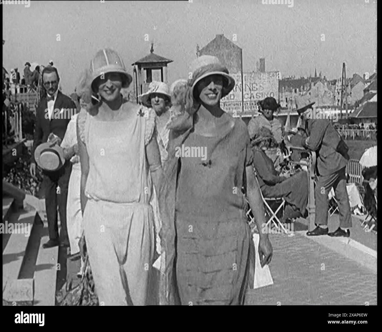 Two Female Civilians Wearing Smart Outfits Walking Towards the Camera ...