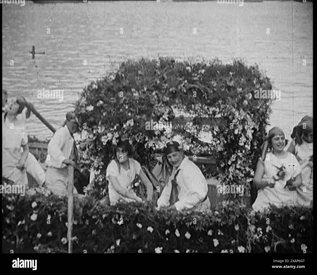 Civilians on a Boat Heavily Decorated with Flowers, 1920s. From "Time ...