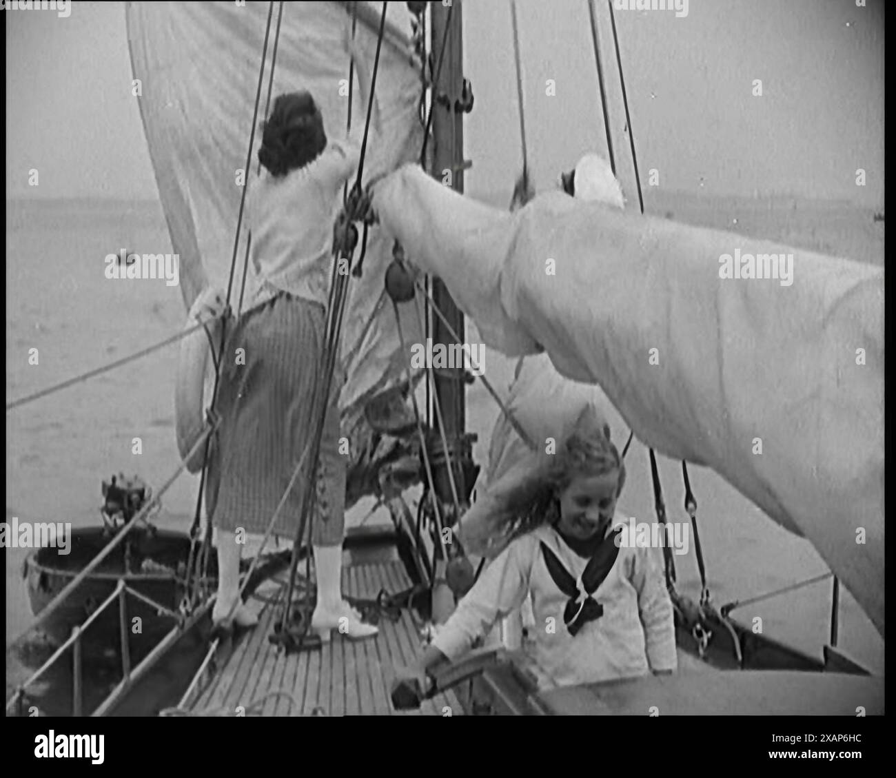 Female Civilians Wearing Summer Outfits and a Captain's Hat Onboard of ...