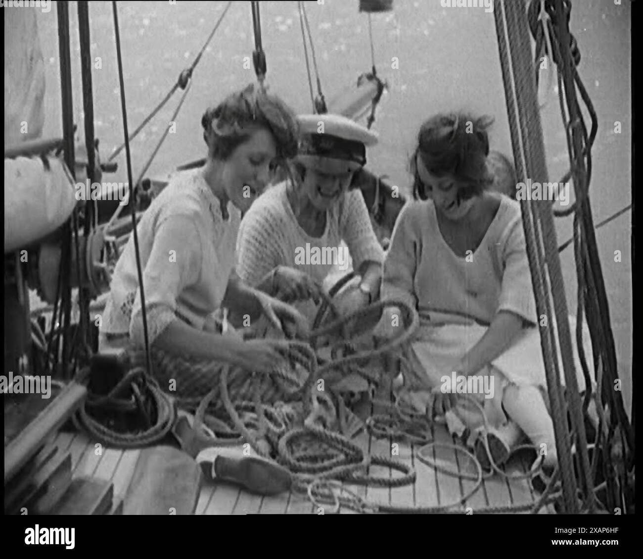 Female Civilians Wearing Summer Outfits and a Captain's Hat Onboard of ...