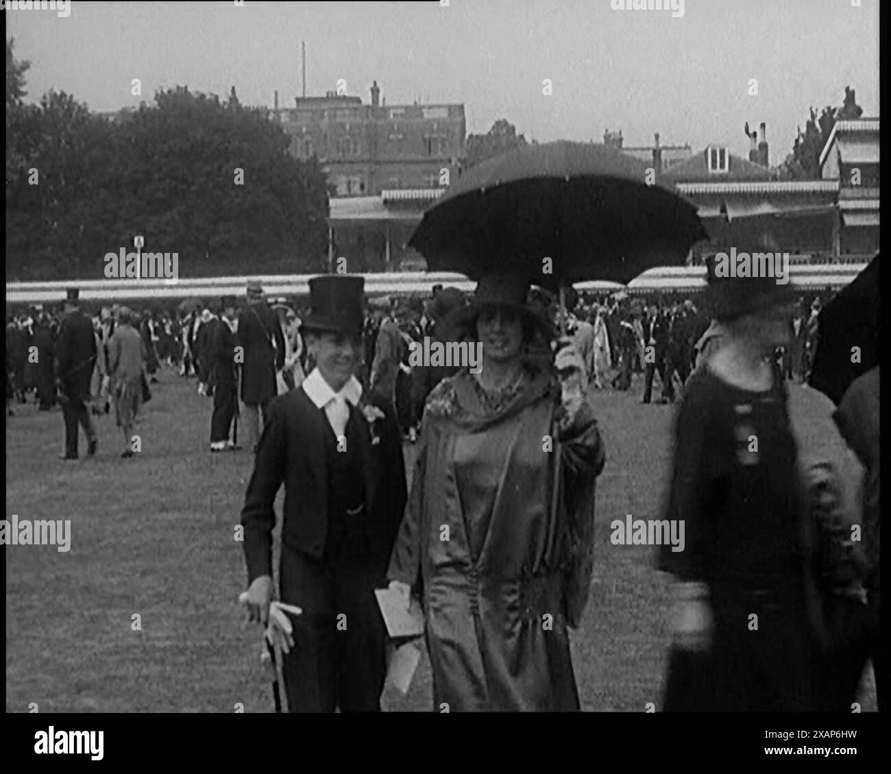 A Group of Civilians Dressed Glamorously Walking on the Grounds of a ...