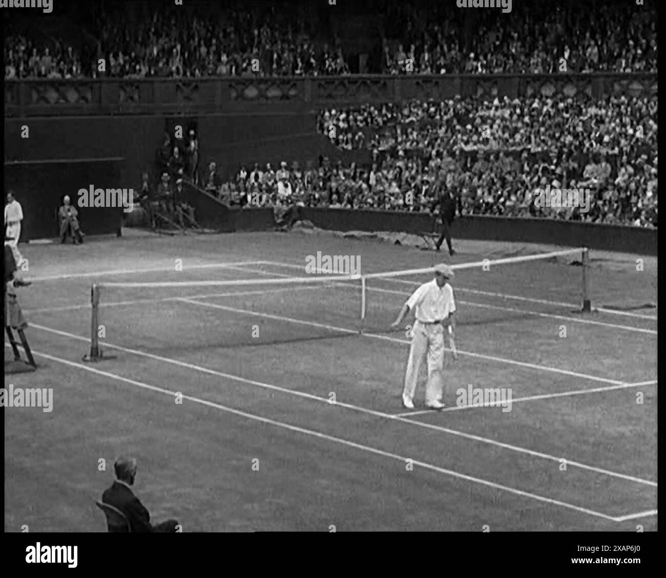 Two Male Civilians Playing a Match of Tennis at Centre Court at the All ...