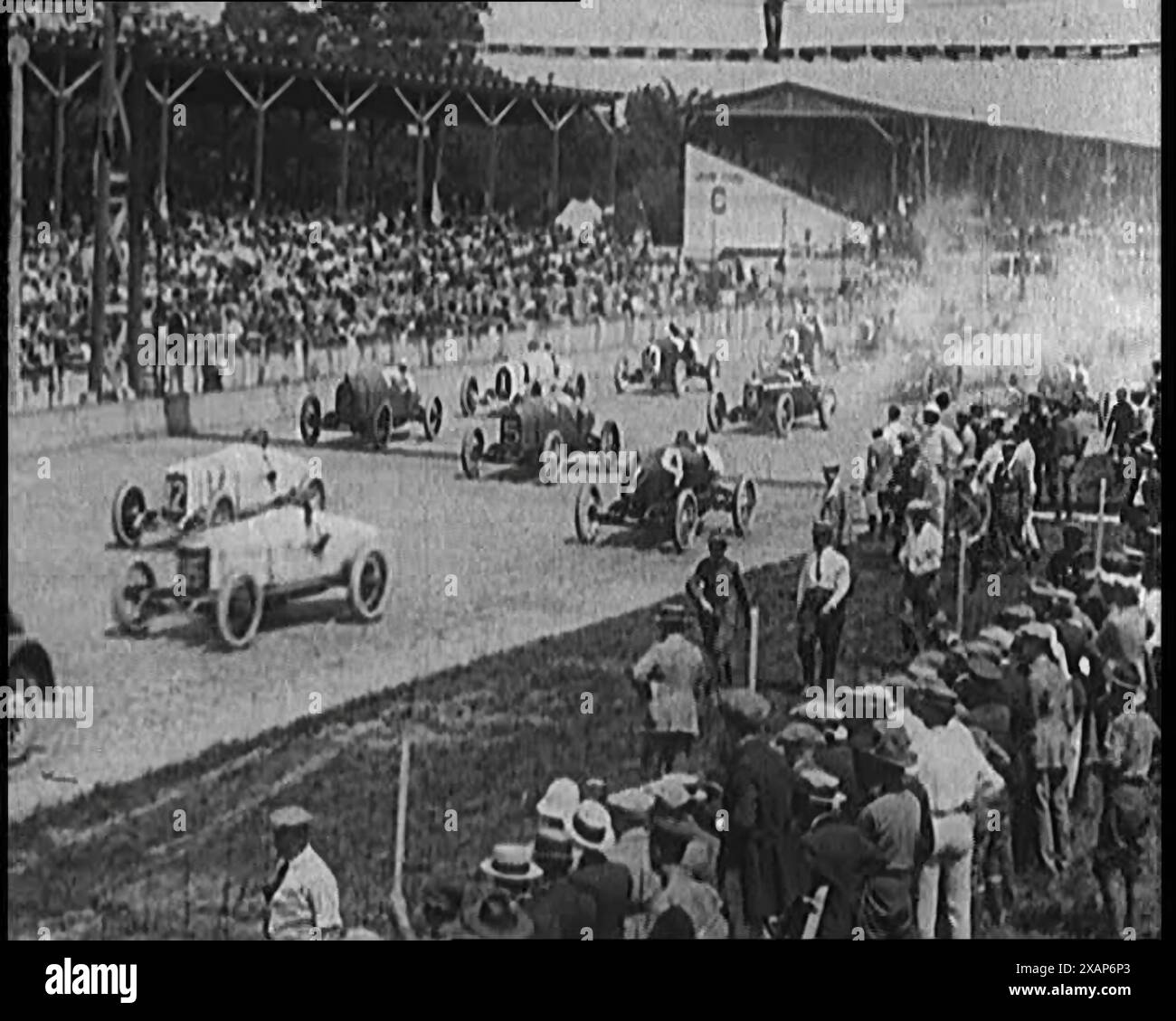 Racing Cars at the Start of a Race in Front of a Large Crowd, 1920s ...