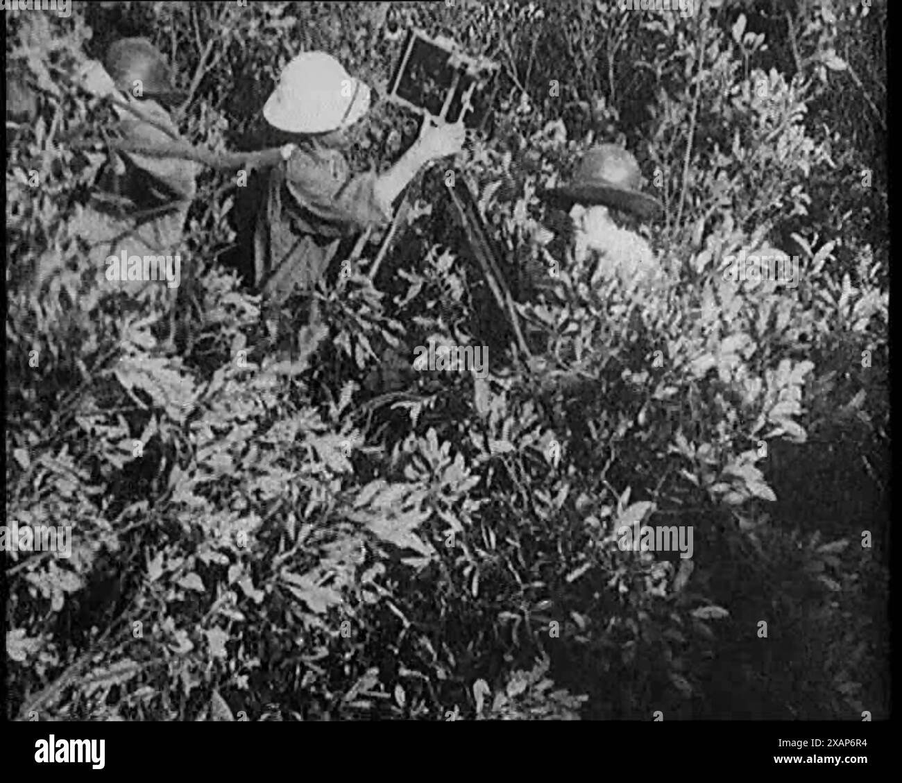 Female Civilians Wearing Explorers Outfit Setting up a Camera to Record ...