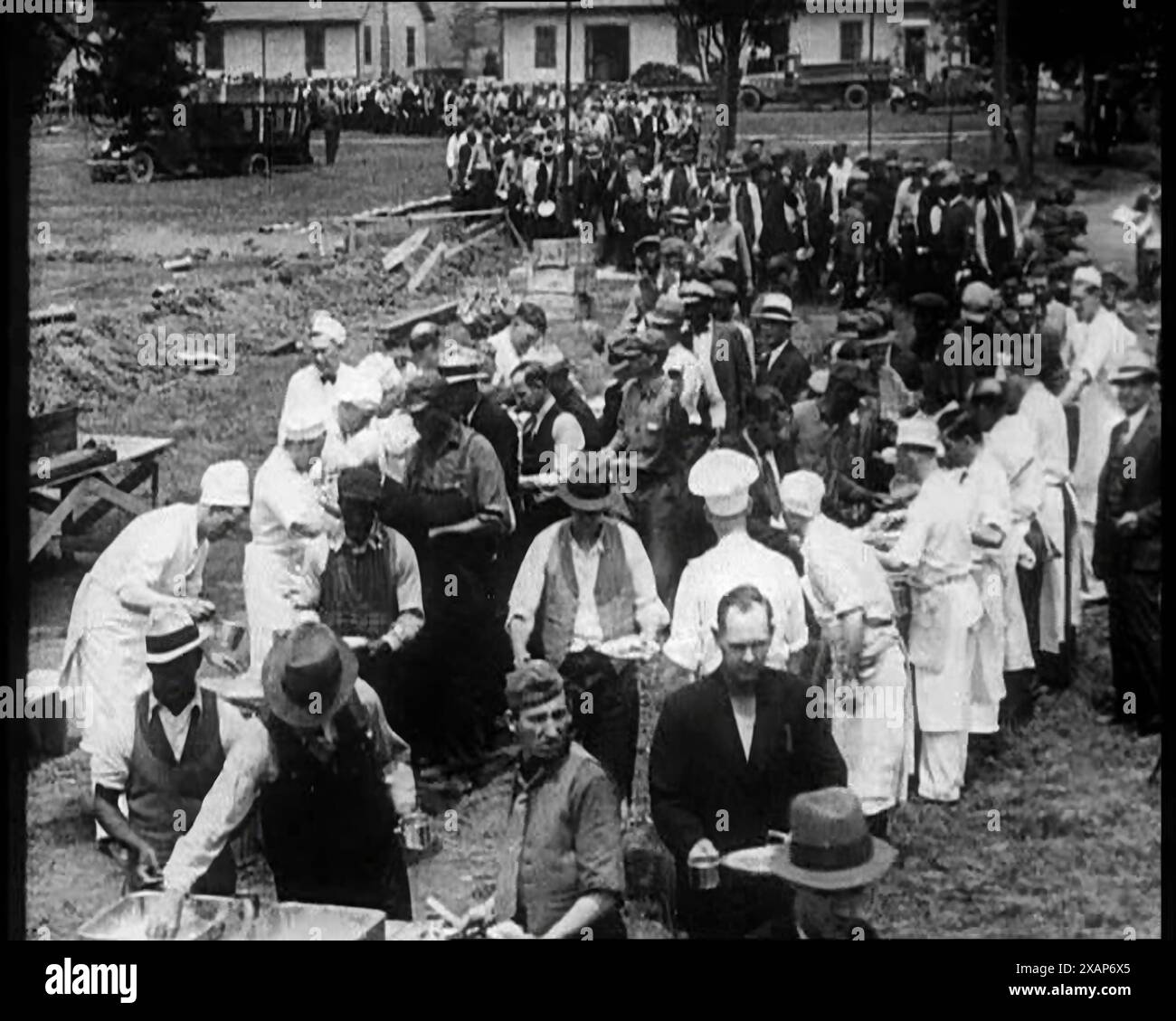 American Civilians Serving Meals for a Large Crowd on a Queue Outdoors ...