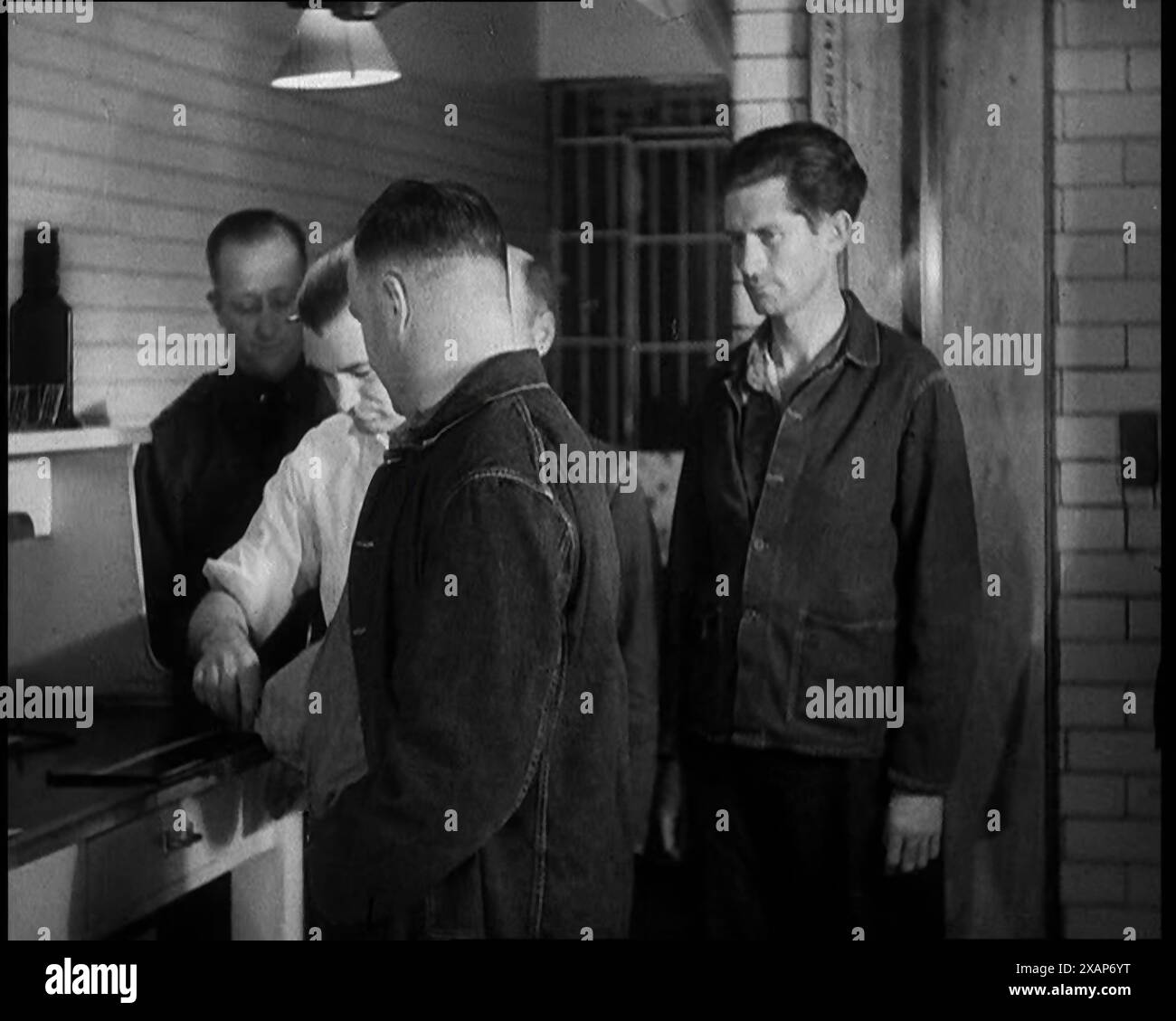 A group of Male Americans Civilians Wearing Prisoners Outfits Having ...