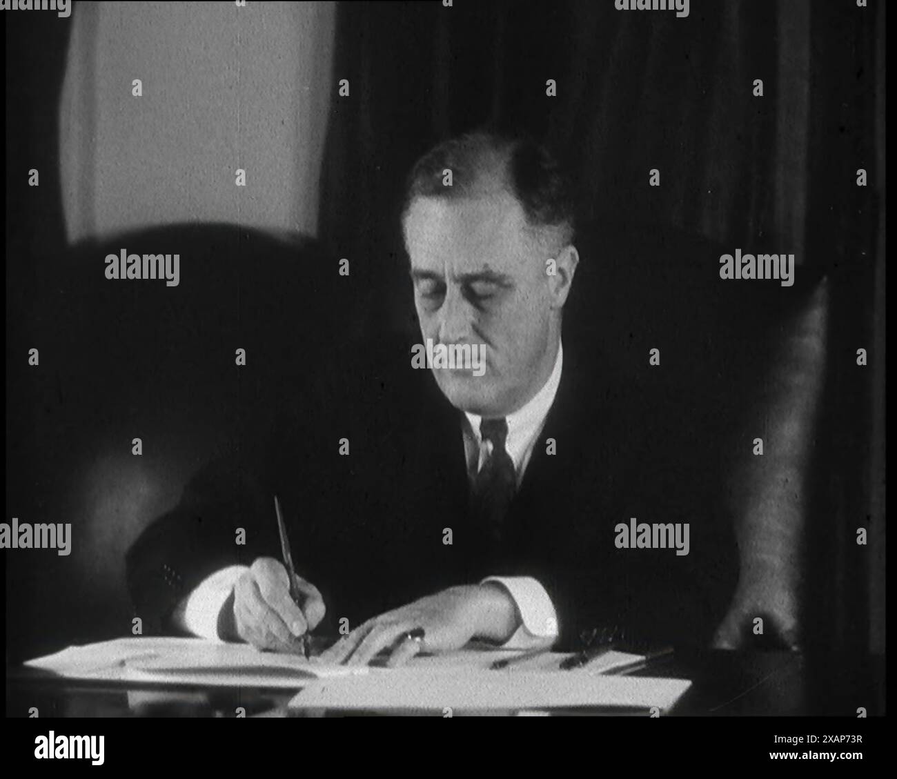 President Franklin D Roosevelt Signing Papers Behind a Desk, 1930s ...