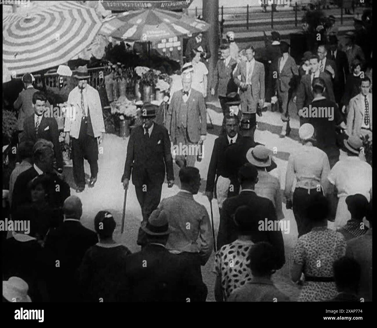Crowd of Well Dressed People Walking Down the Pavement, 1933. From ...