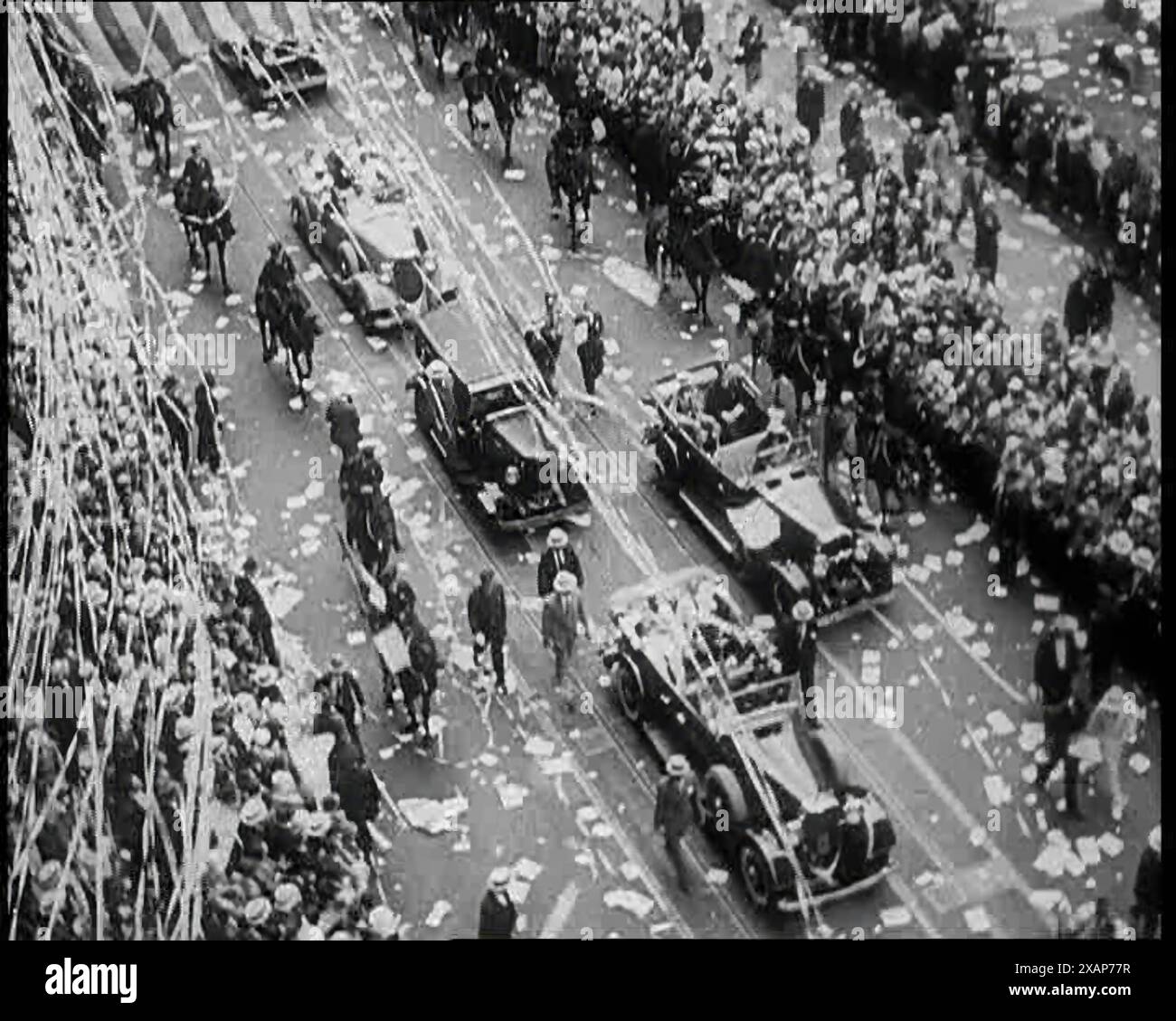 Cars Driving Down in a Parade Watched by Crowds, 1933. 'A great Armada ...