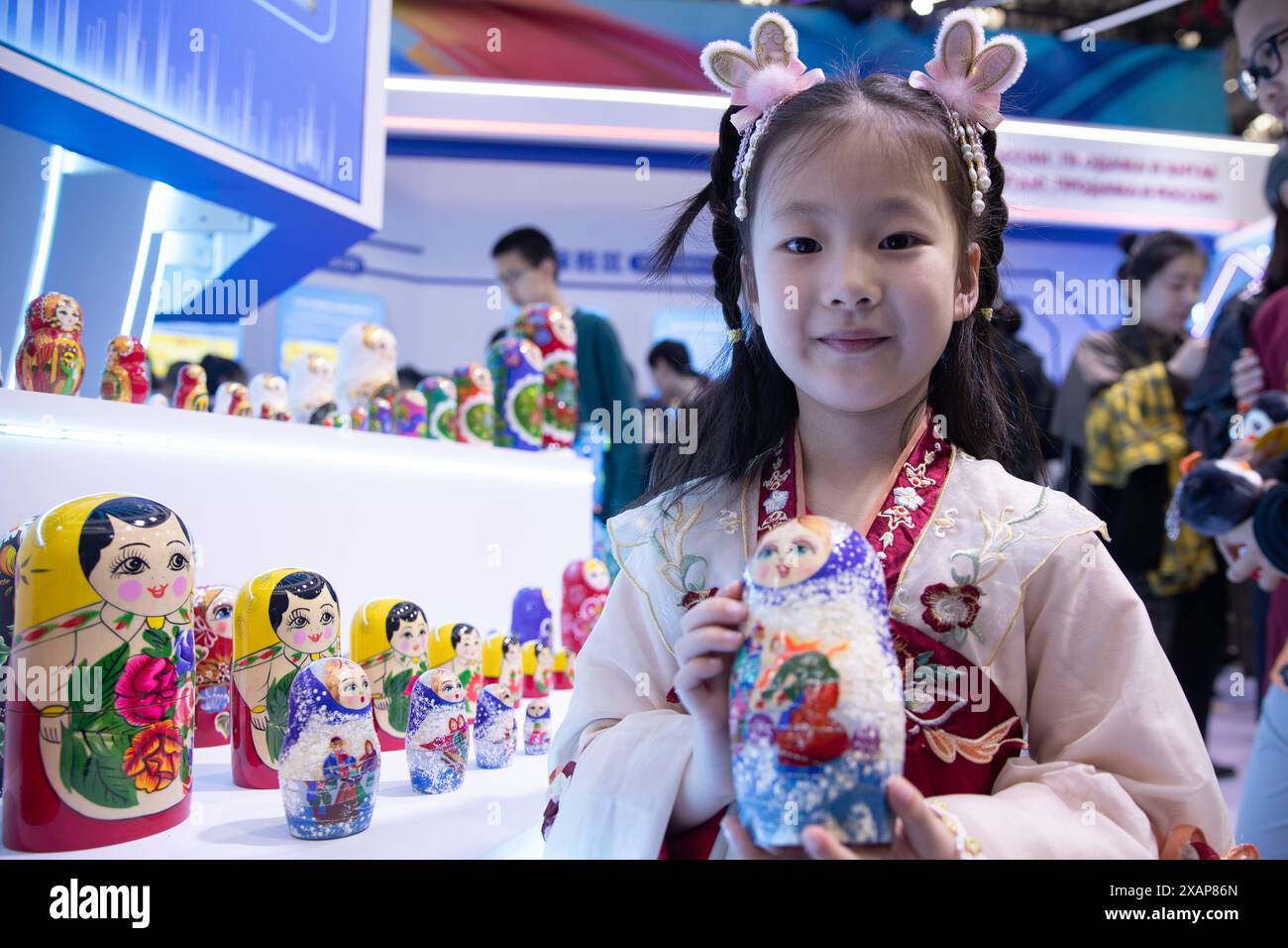 Harbin, China's Heilongjiang Province. 19th May, 2024. A girl poses for ...