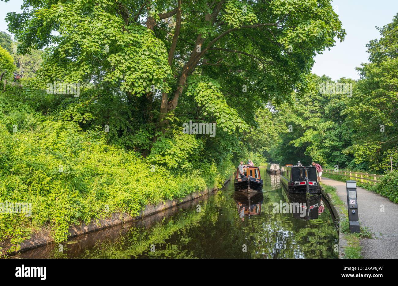 Narrow canal boat navigating the Llangollen canal built by Thomas ...