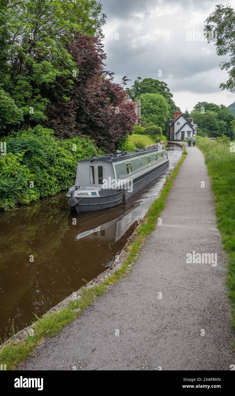 Narrow canal boat navigating the Llangollen canal built by Thomas ...