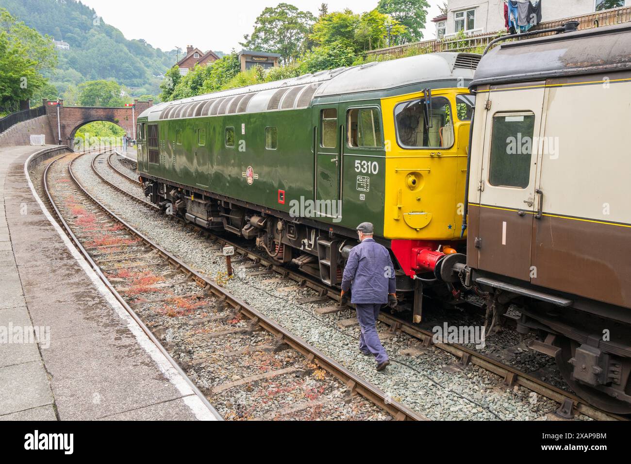 A restored Class 26 diesel locomotive with passengers at the Llangollen ...