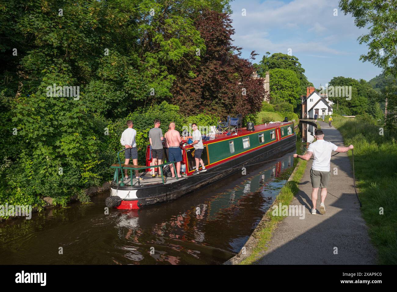 Narrow canal boat navigating the Llangollen canal built by Thomas ...
