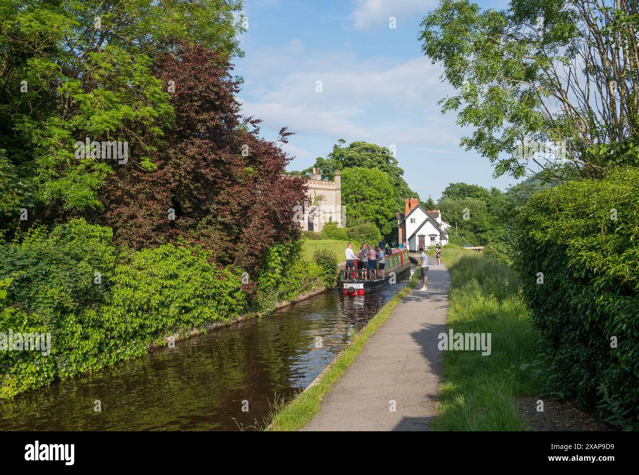 Narrow canal boat navigating the Llangollen canal built by Thomas ...