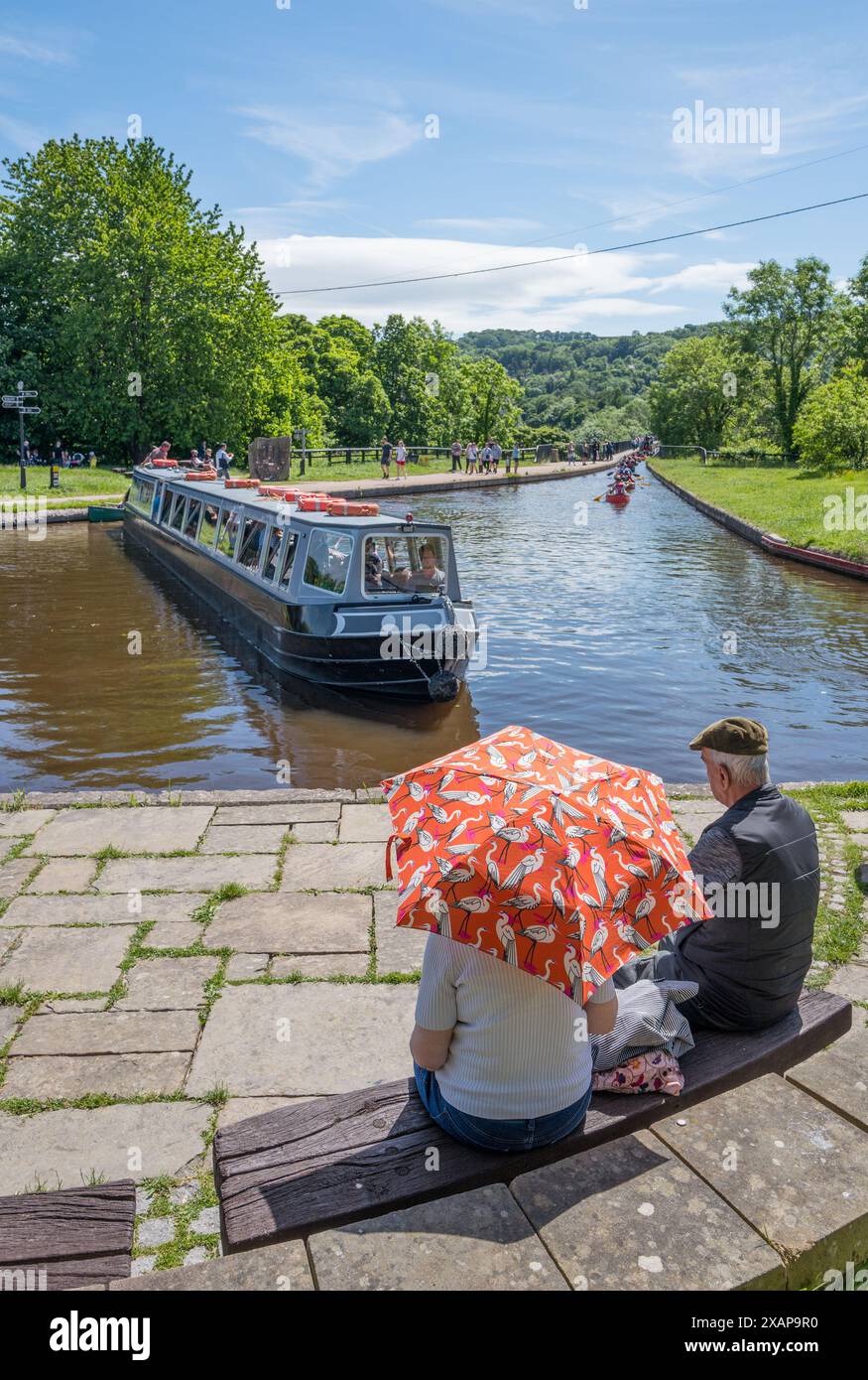 Narrow boats and two man canoes at the Trevor basin on the Llangollen ...